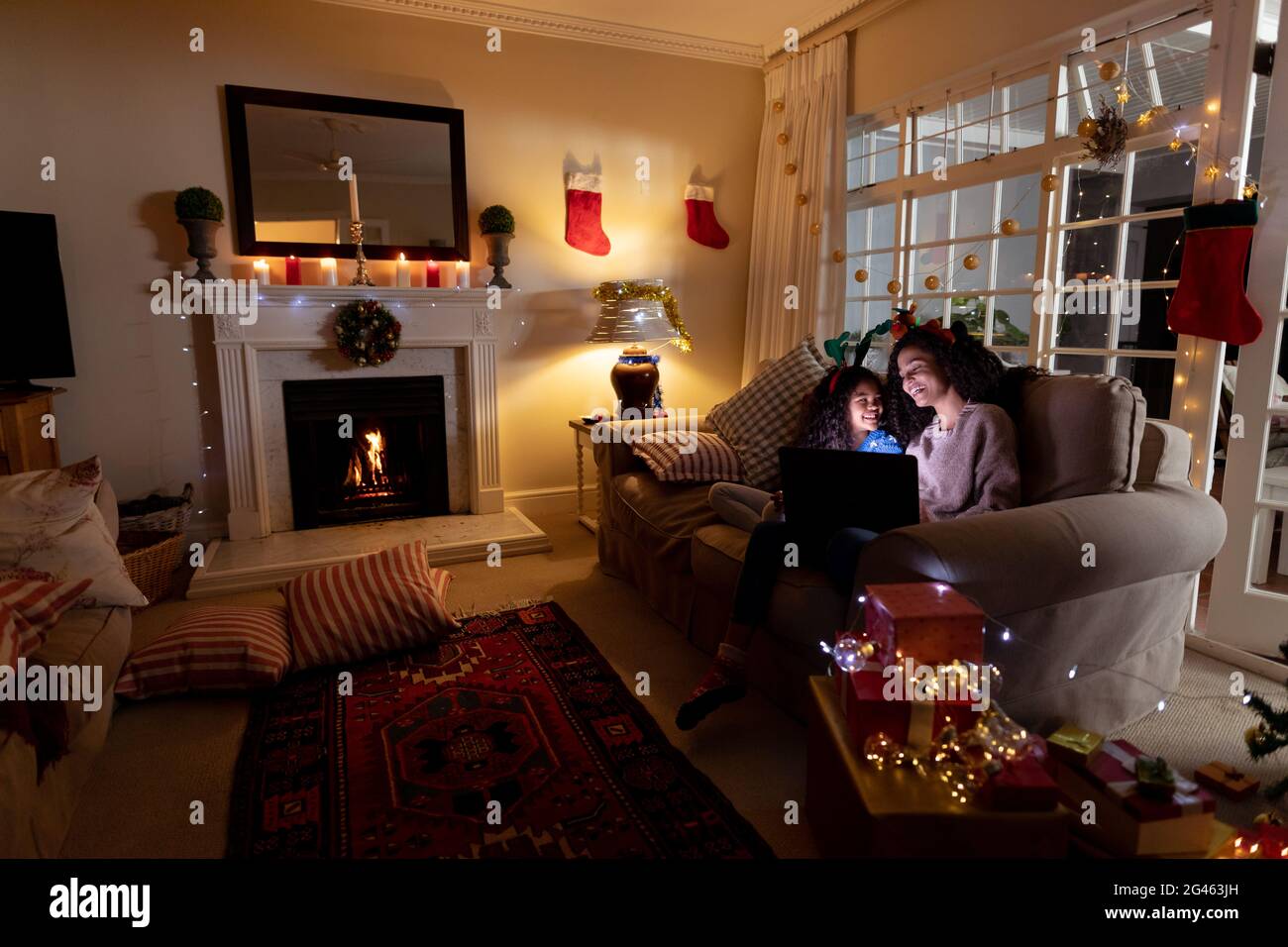 Family at home at Christmas time Stock Photo - Alamy