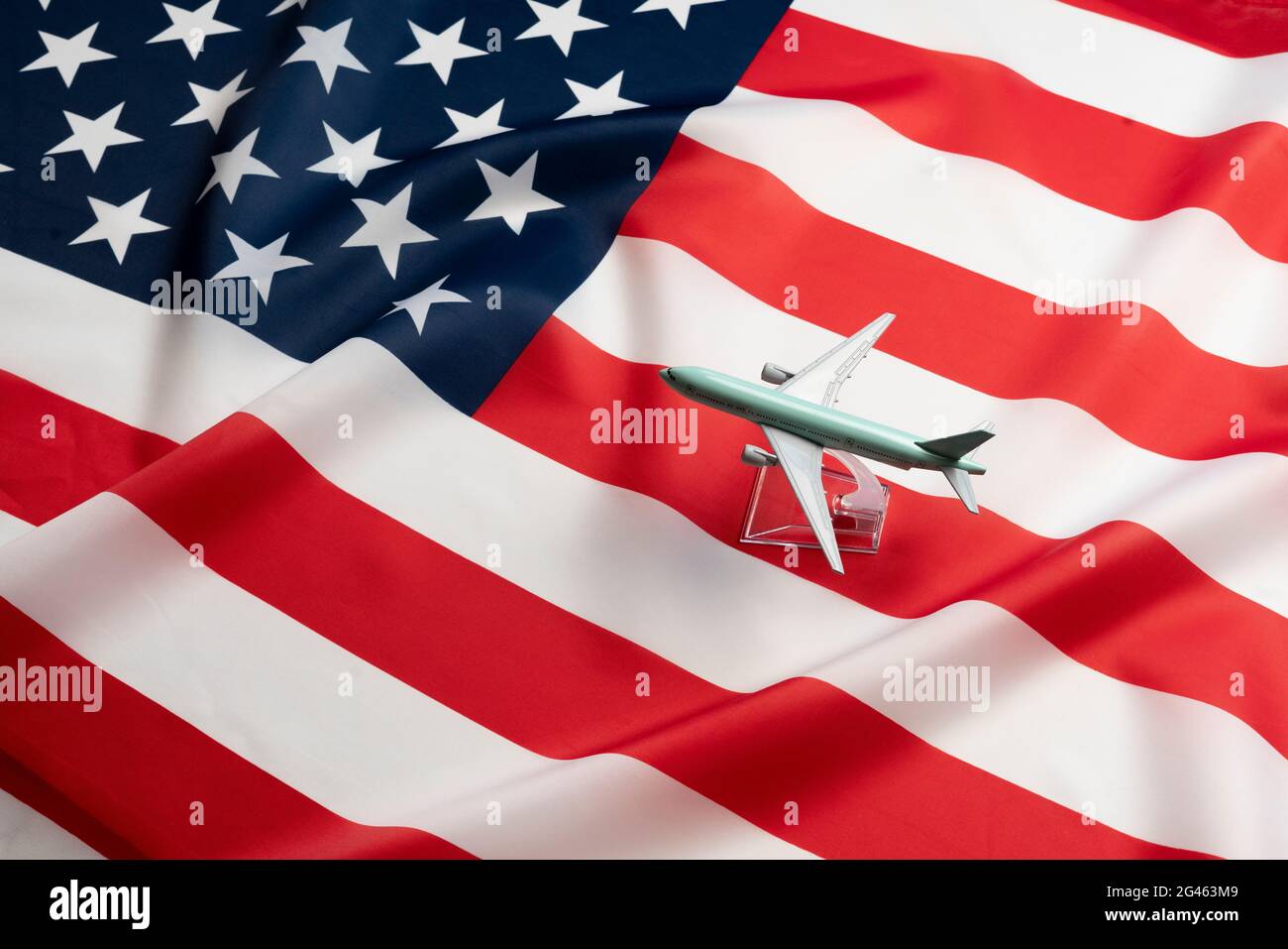 airplane on the usa flag as a symbol of passenger transportation Stock ...