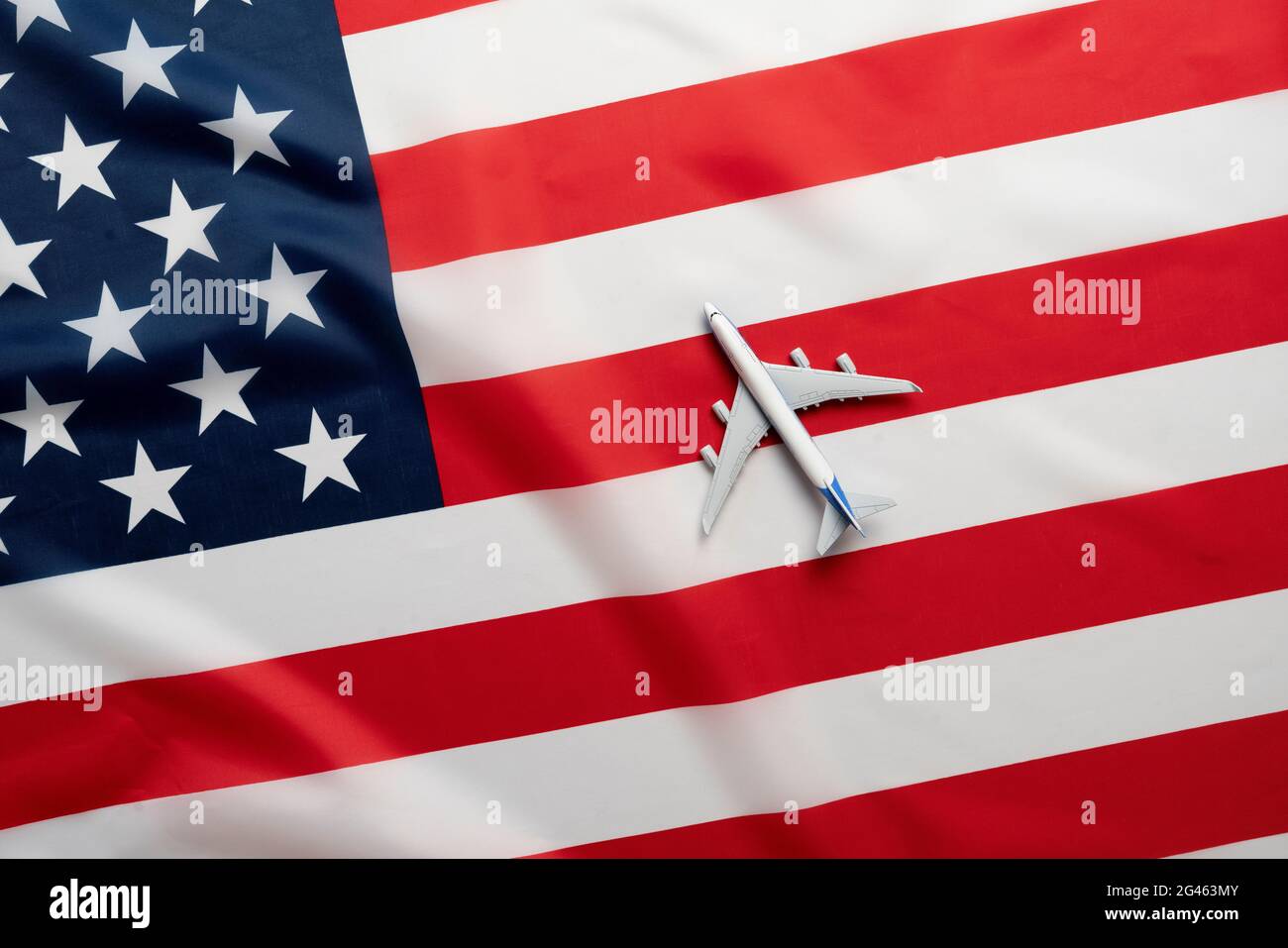 airplane on the usa flag as a symbol of passenger transportation Stock ...