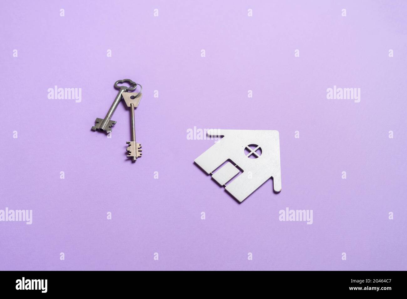 flat lay of home keys on the table, symbol of real estate investment ...