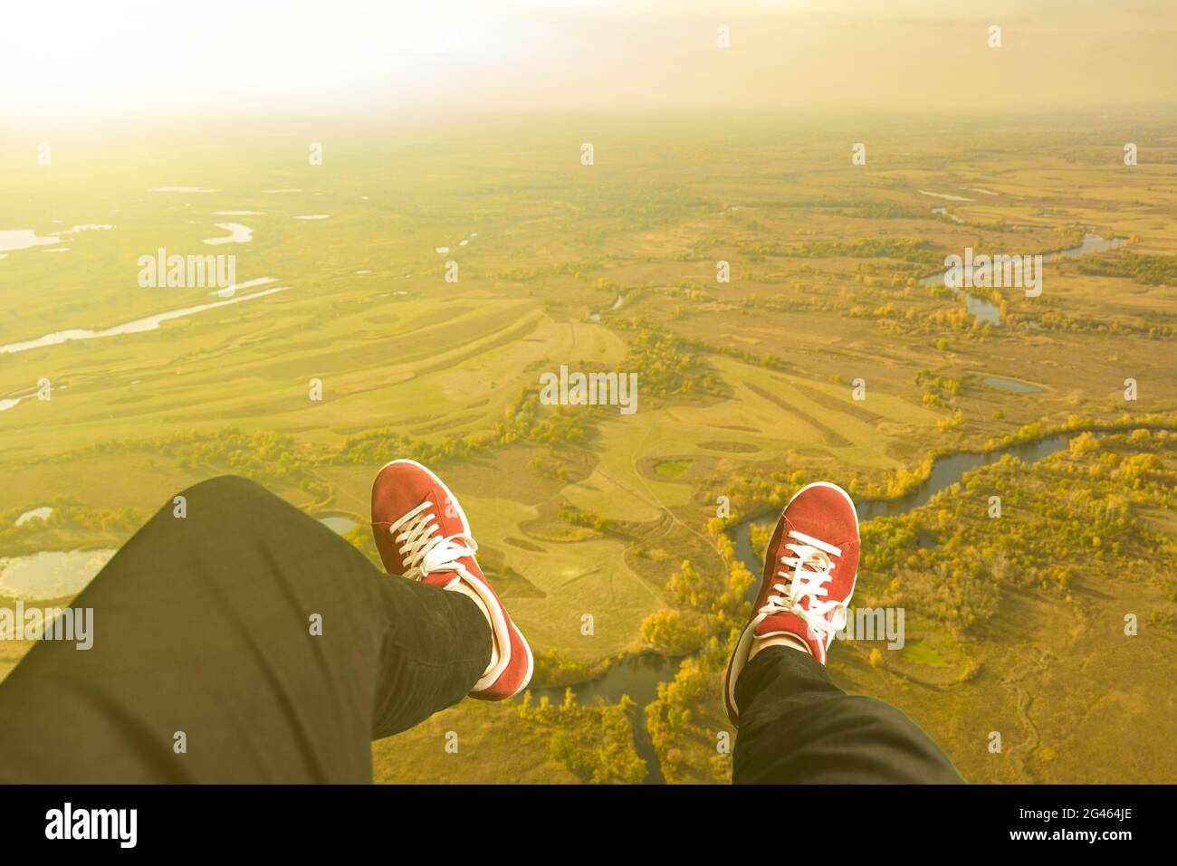 high above top down view, the legs on frame and watching the landscape ...