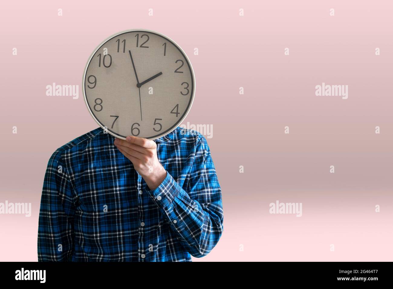time management concept, employee person holding a clock Stock Photo ...