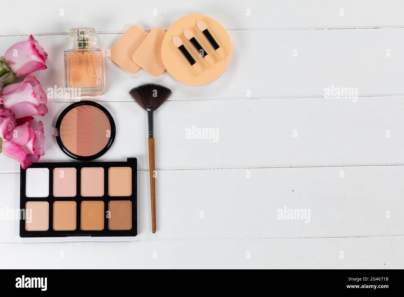 Make up view with pink flowers and perfume on white background Stock ...