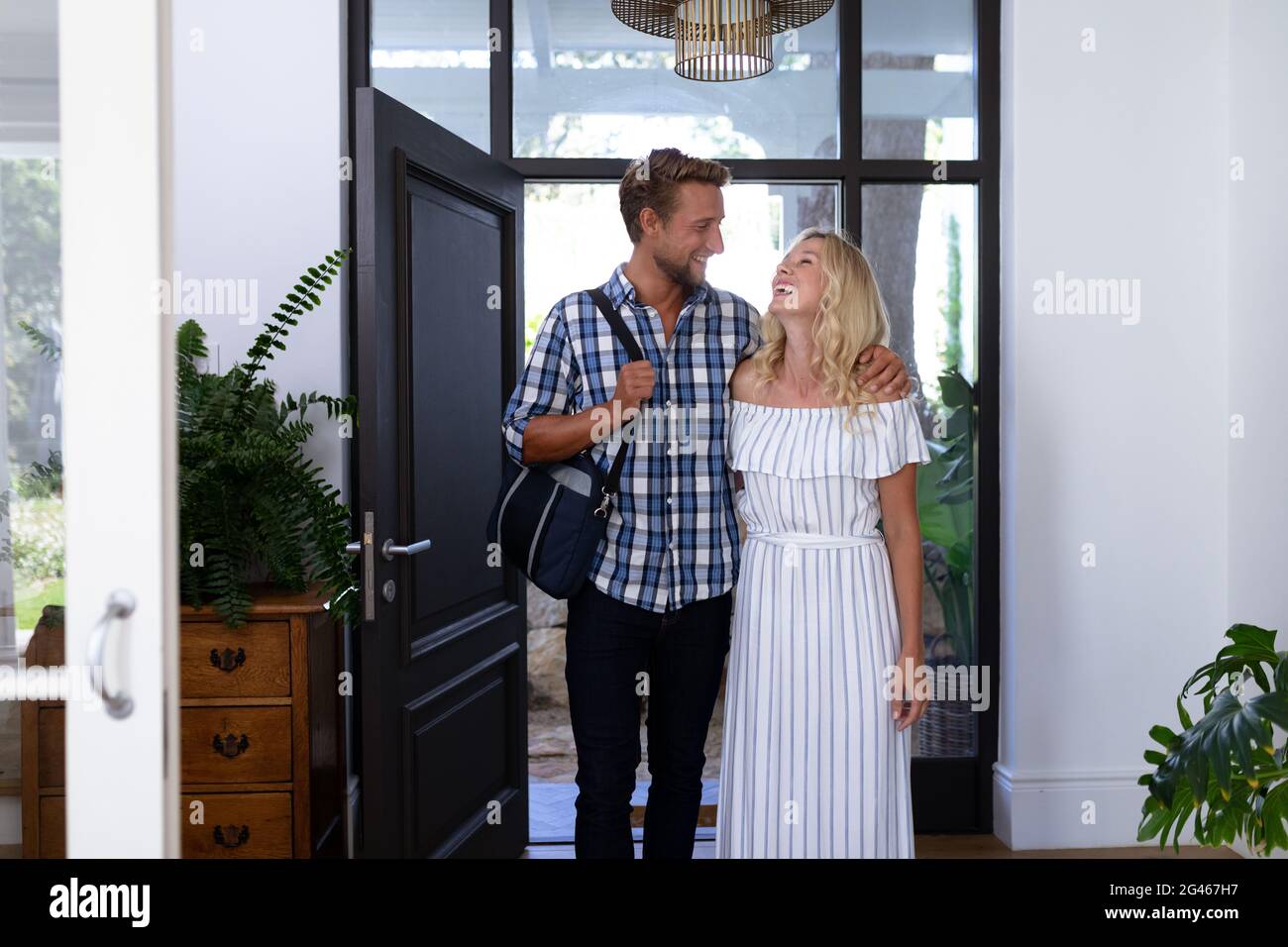 Returning man woman couple hi-res stock photography and images - Alamy