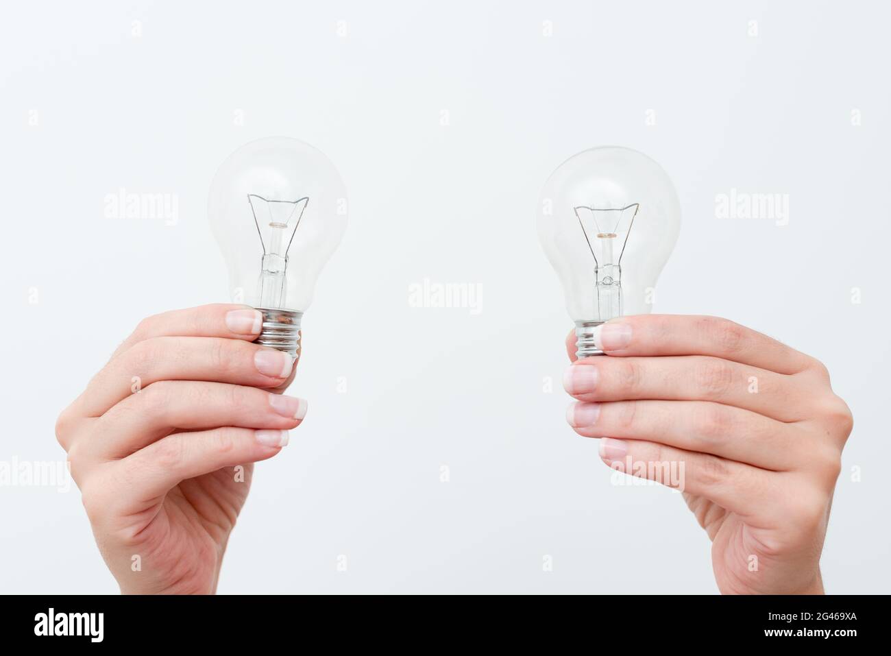 Woman Hands Holding Lamp Presenting Ideas For Project, Man Palm Showing ...