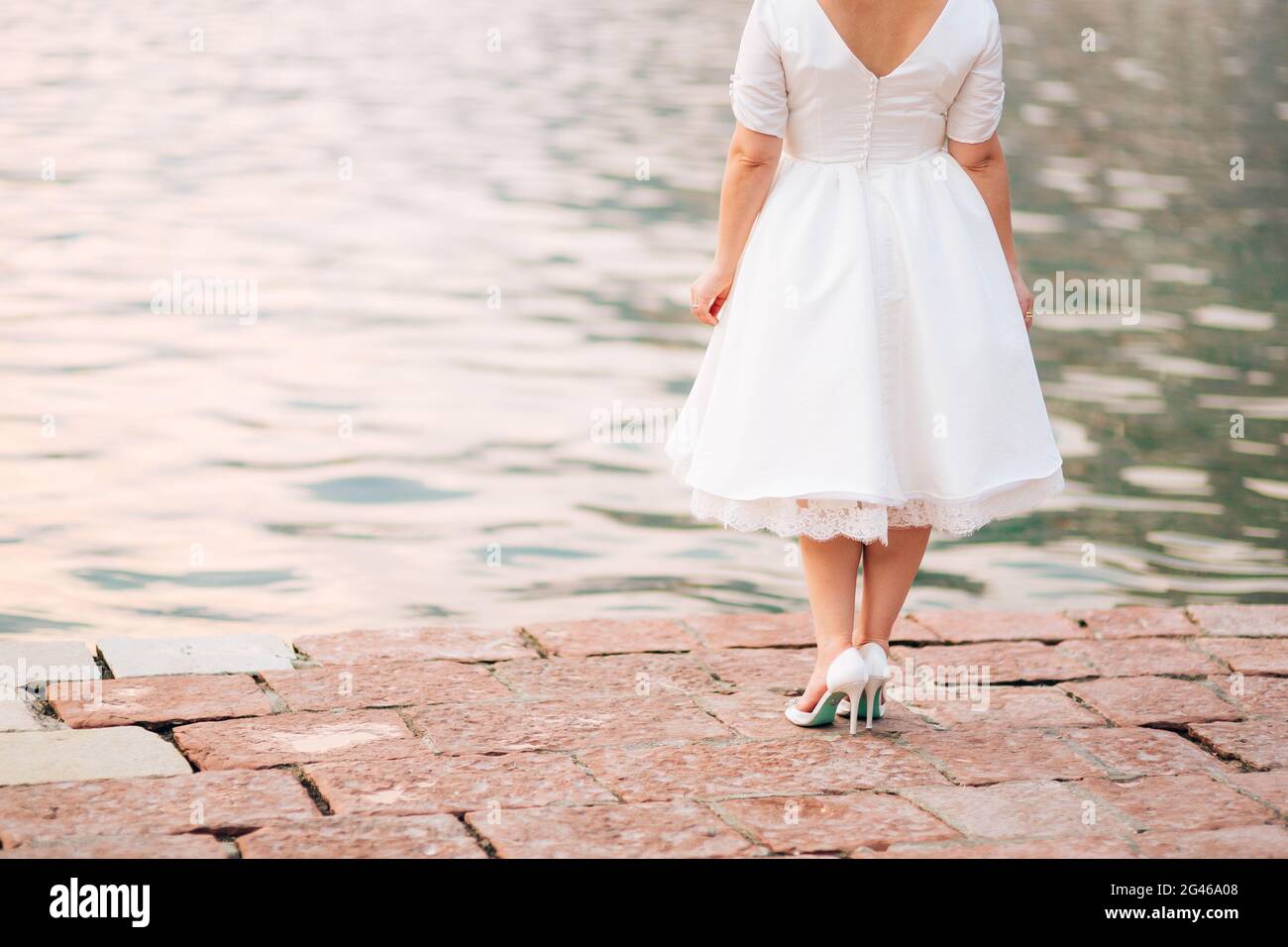 Bride back to the camera Stock Photo - Alamy
