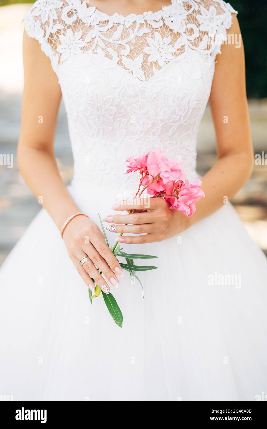 Flowers in girls hands hi-res stock photography and images - Alamy
