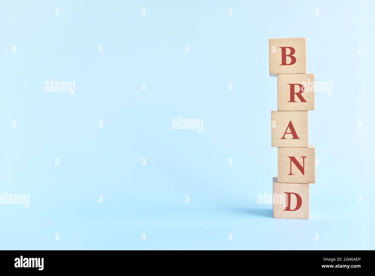 Brand building success in business concept. Hand stacking wooden blocks ...