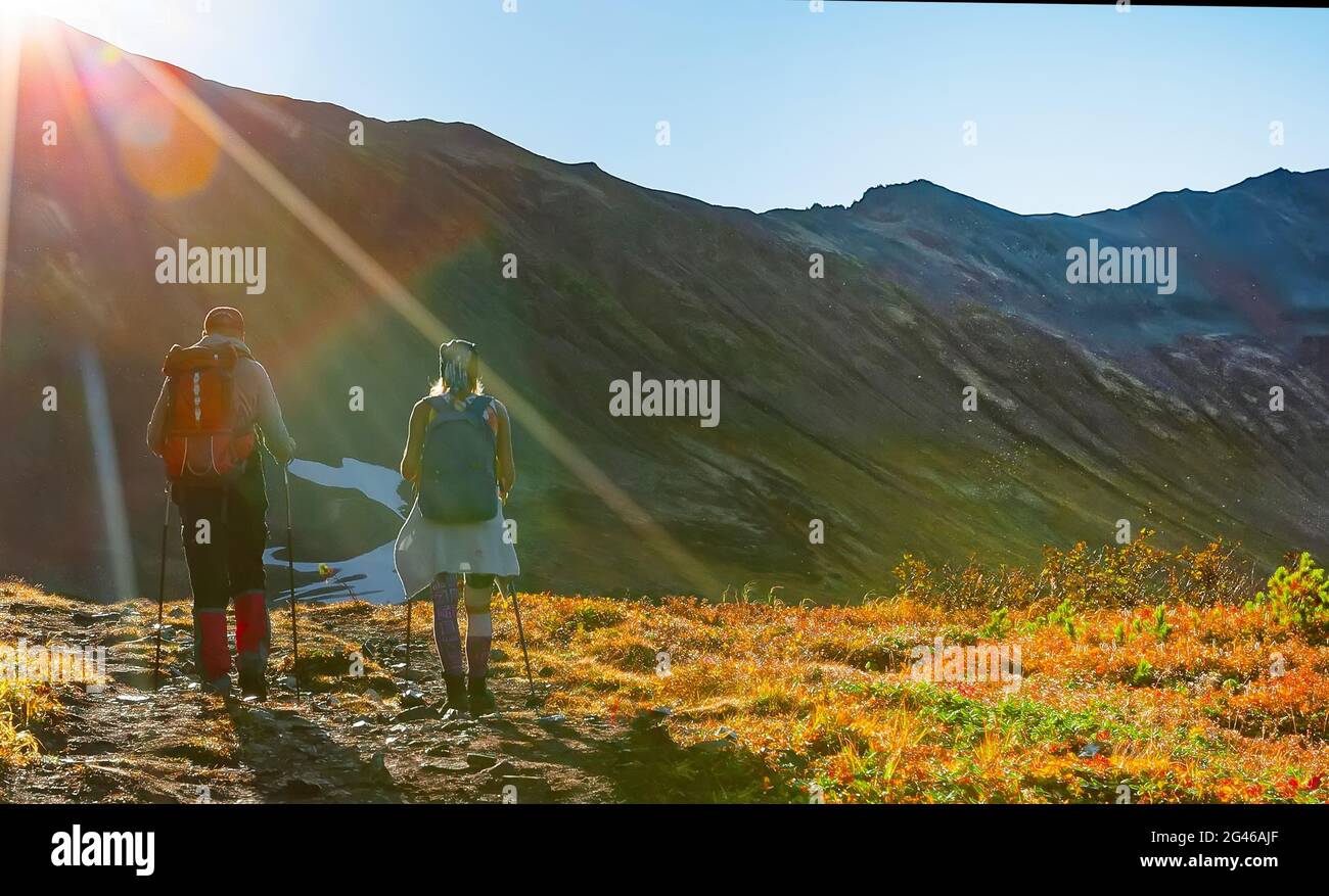 Couple hikers climbing steep trail hi-res stock photography and images ...