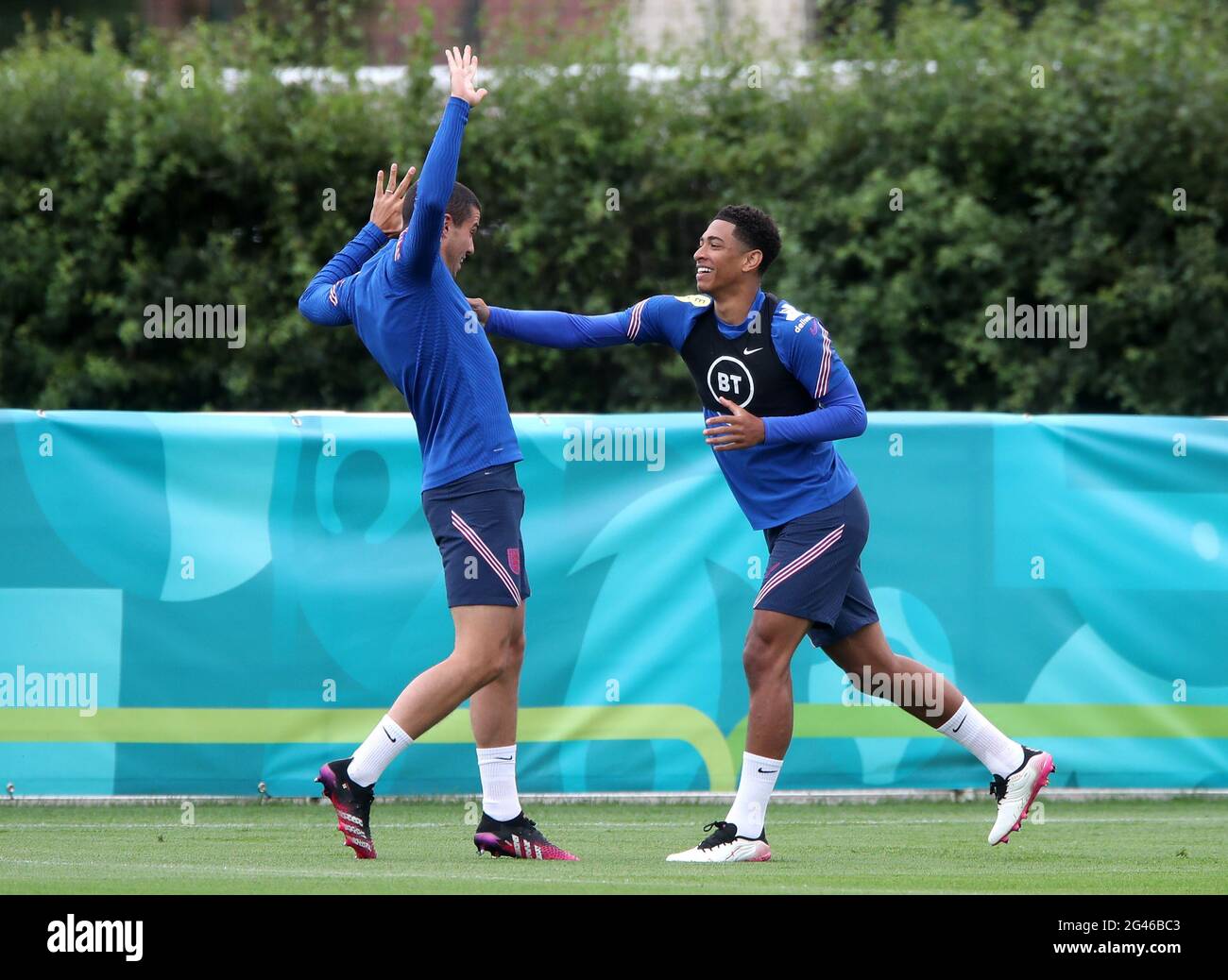 England's Jude Bellingham (right) during the training session at ...