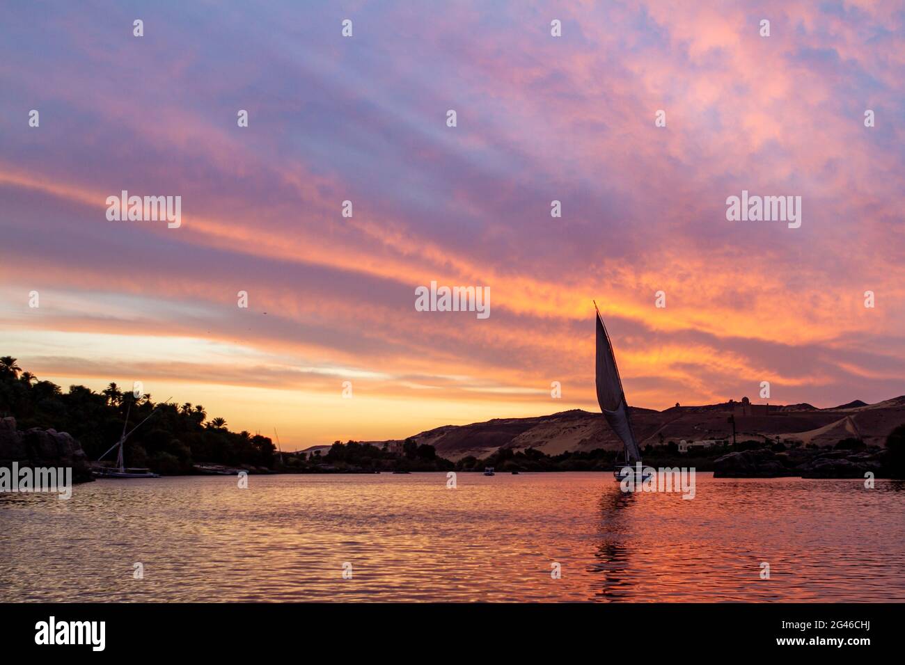 Sunset with feluccas on the Nile in Egypt Stock Photo - Alamy