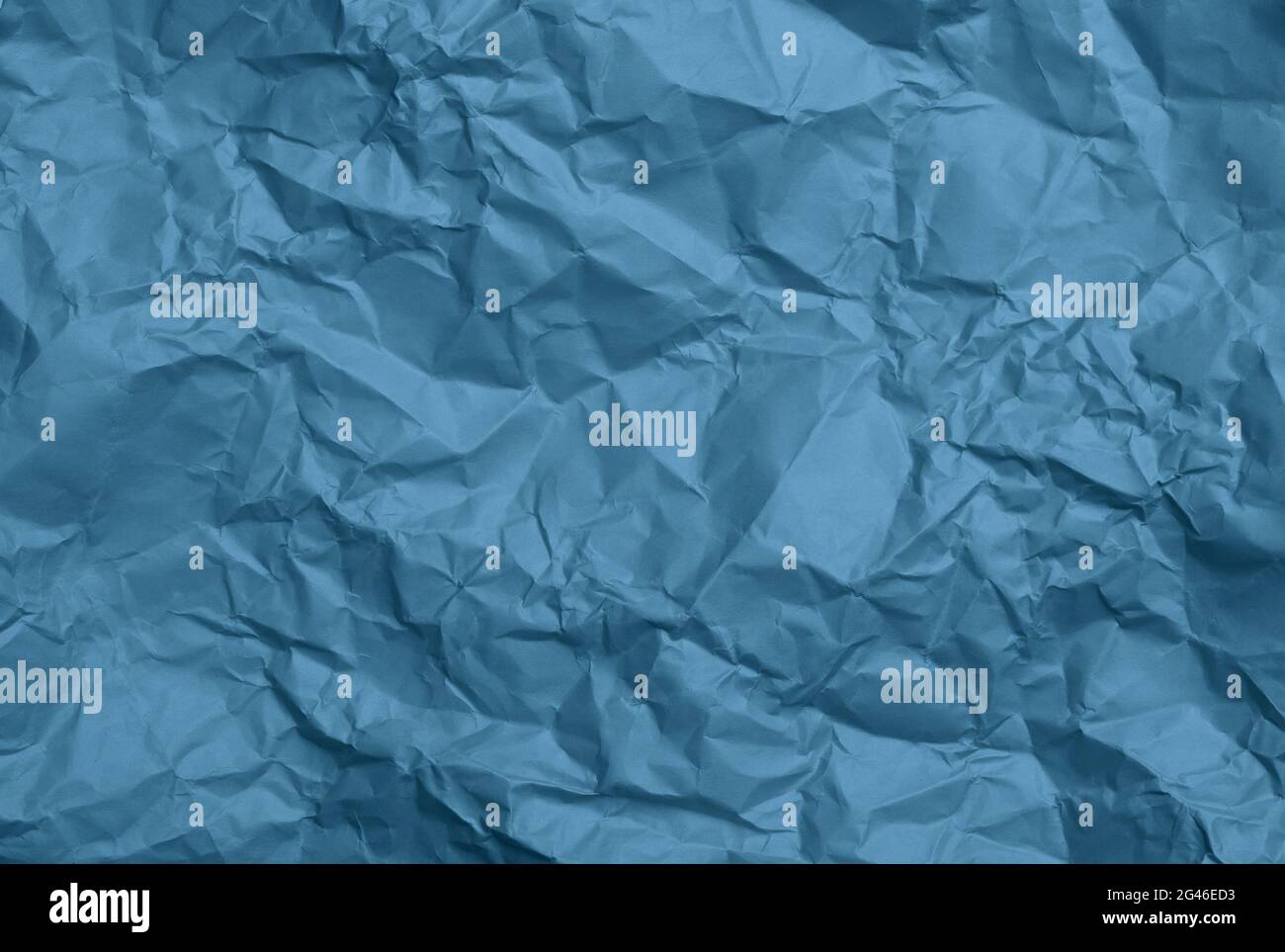 Crumpled sheet of blue paper, creases and scuffs Stock Photo - Alamy
