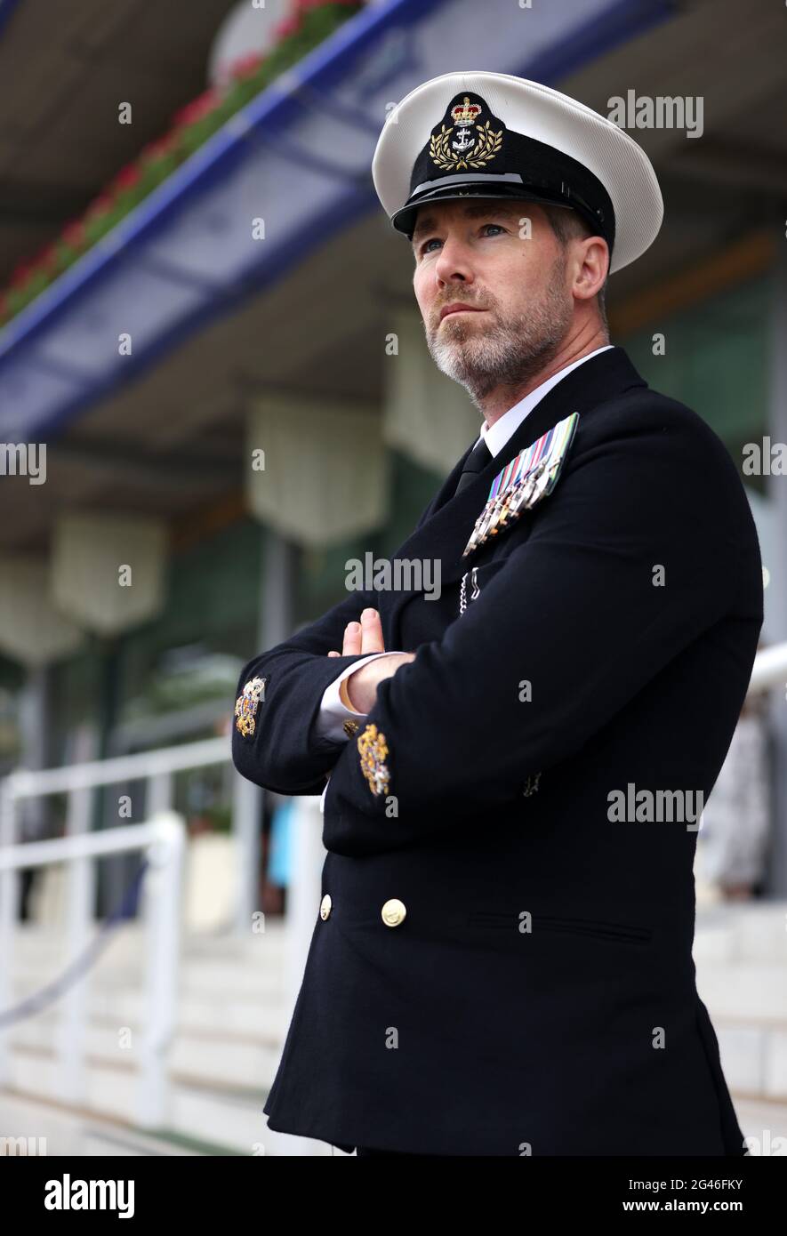 A member of the military looks towards the parade ring during day five ...