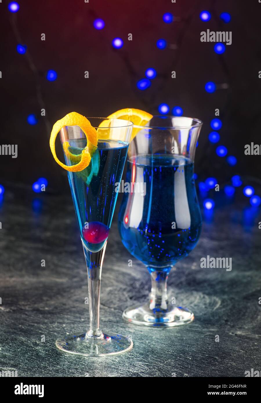 Traditional cocktail volcano with blue curacao and champaign offered as ...