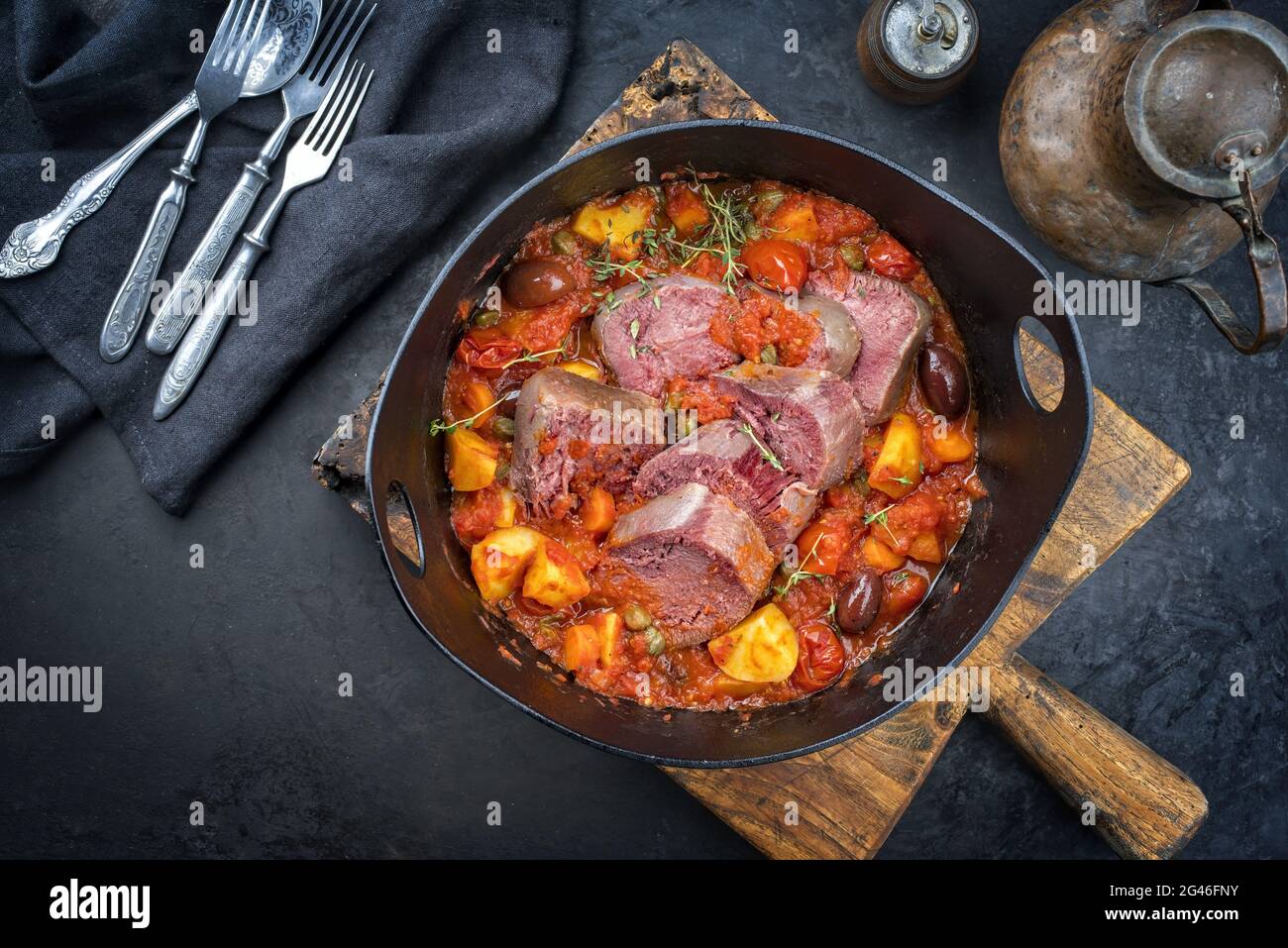 Modern style traditional Peruvian estofado de lengua cooked beef tongue ...
