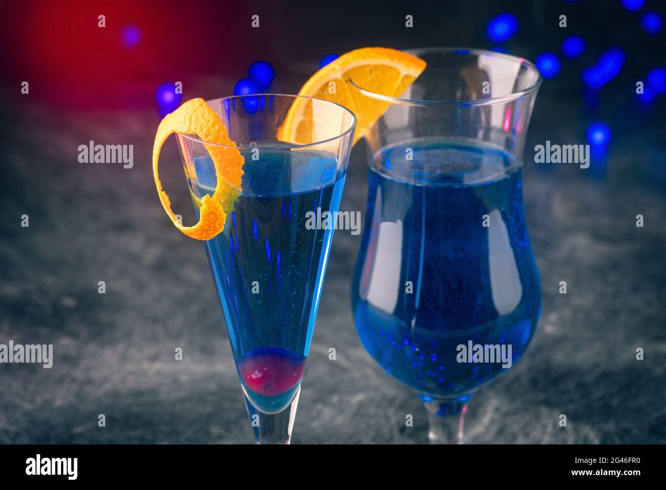 Traditional cocktail volcano with blue curacao and champaign offered as ...