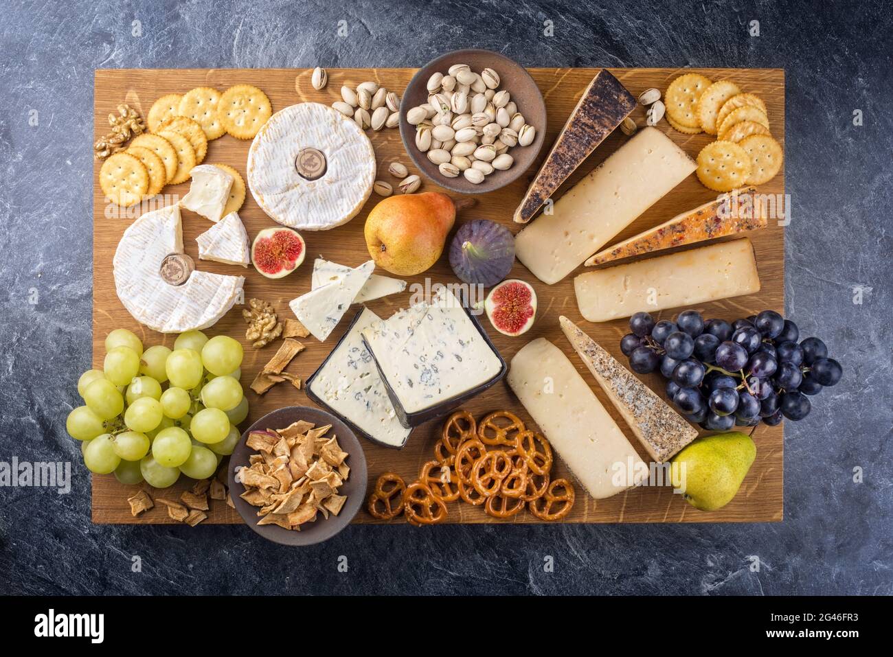 Modern style traditional party platter with soft cheese Stock Photo - Alamy