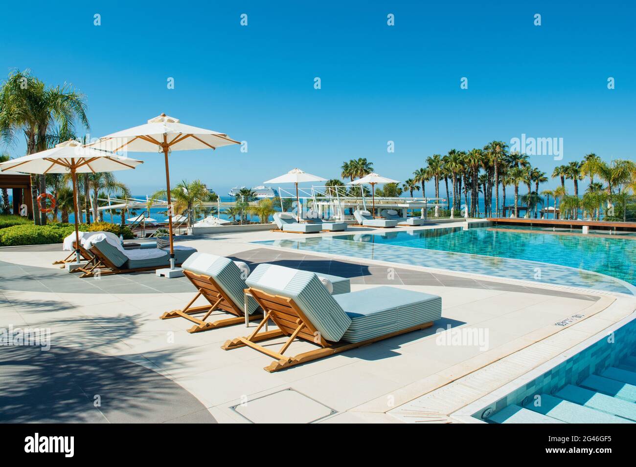 Limassol, Cyprus - May 19, 2021: Pool area in luxury hotel with sunbeds ...