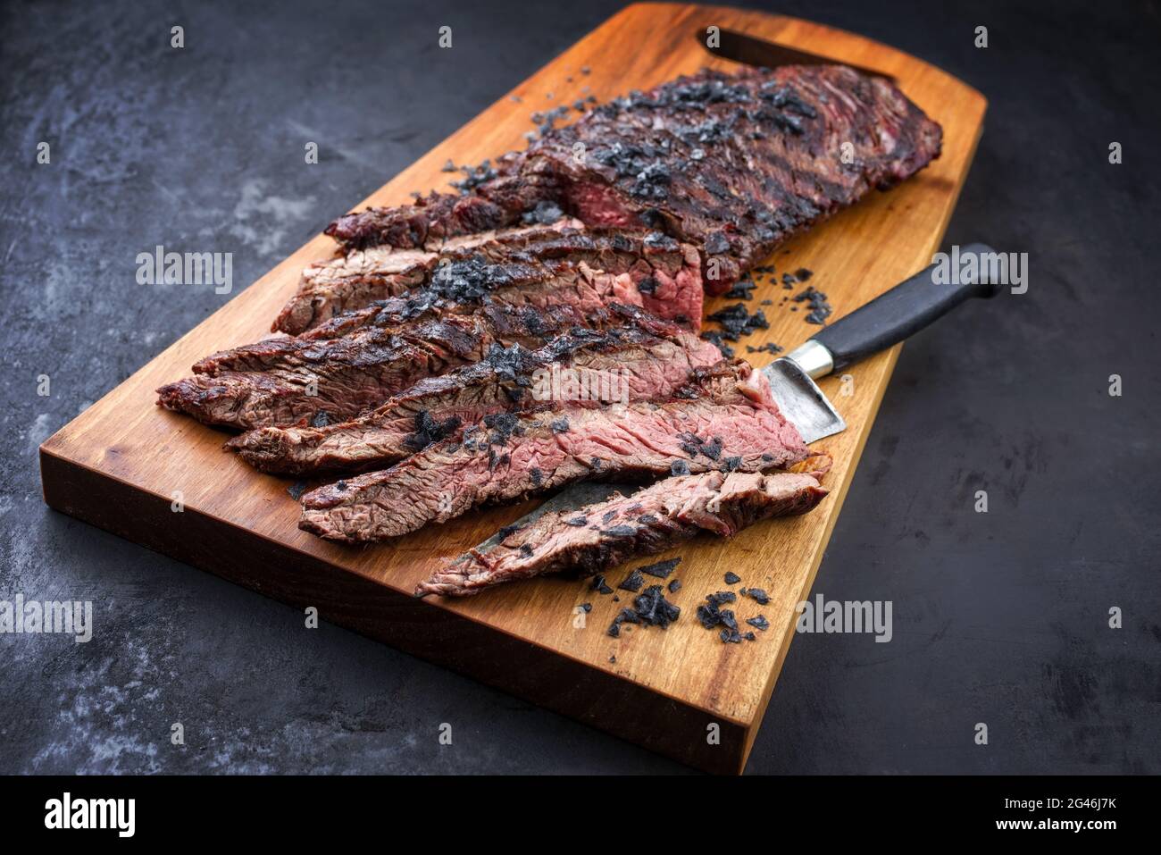 Barbecue wagyu bavette beef steak with black salt offered as close-up ...