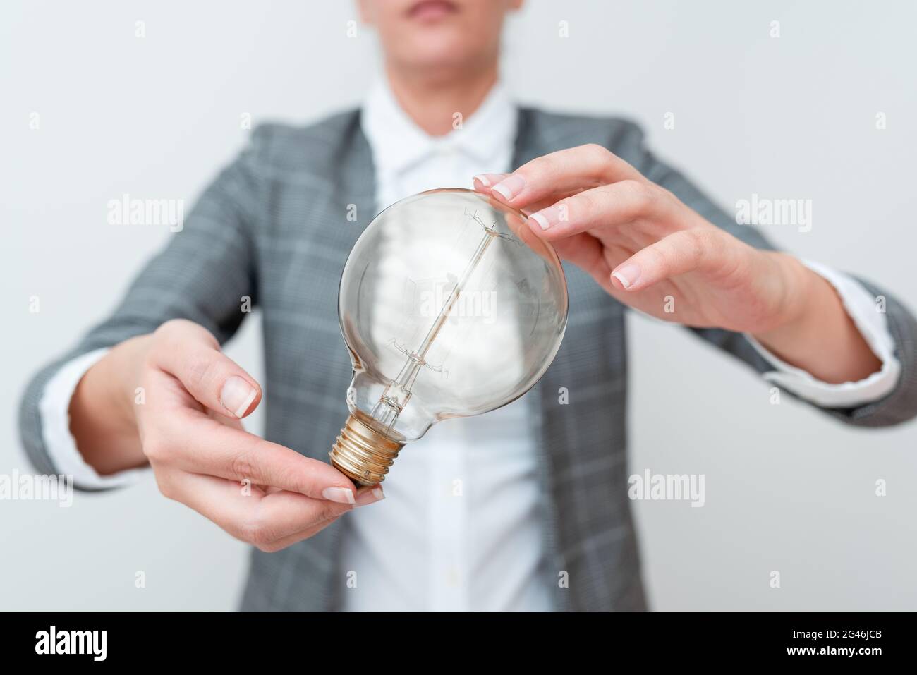 Lady Holding Lamp With Formal Outfit Presenting New Ideas For Project ...