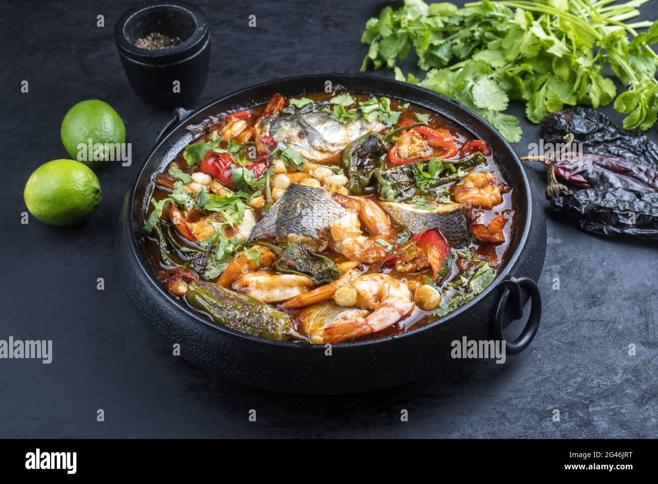 Modern style traditional Mexican seafood pozole soup with fish Stock ...