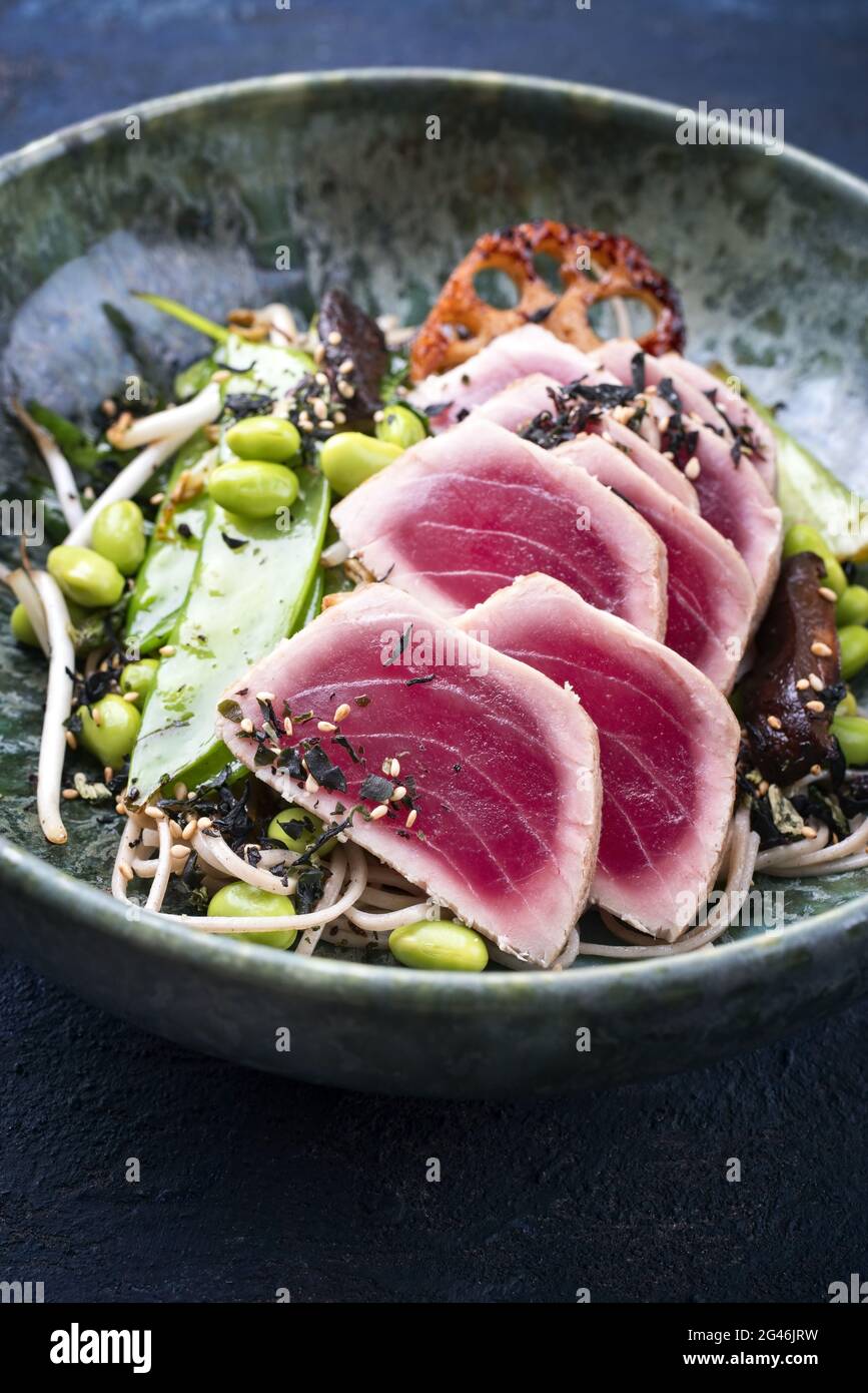 Modern style traditional Japanese gourmet seared tuna fish steak tataki ...