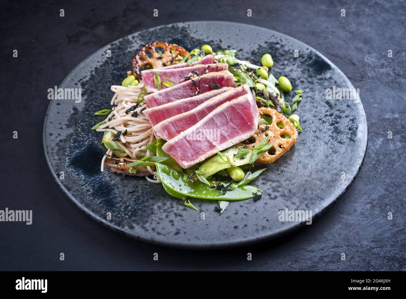 Modern style traditional Japanese gourmet seared tuna fish steak tataki ...