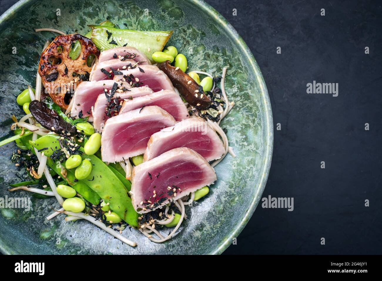 Modern style traditional Japanese gourmet seared tuna fish steak tataki ...