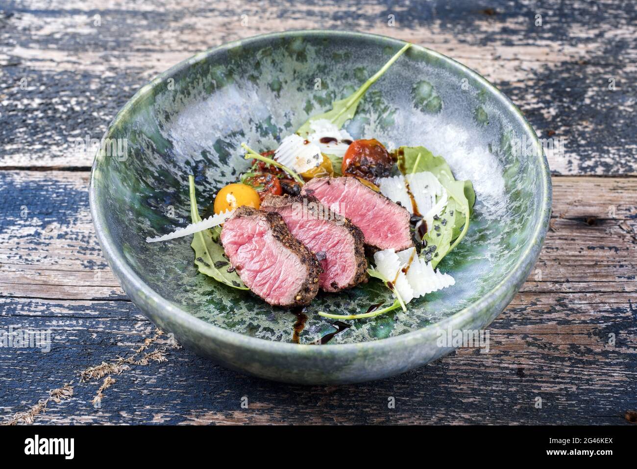 Modern Style Italian tagliata di manzo with dry aged sliced sirloin ...