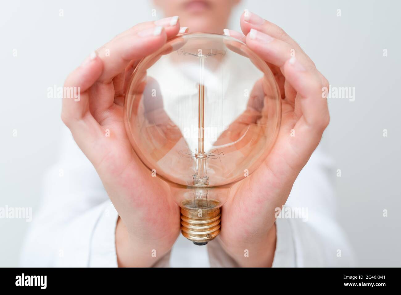 Lady Holding Lamp With Formal Outfit Presenting New Ideas For Project ...