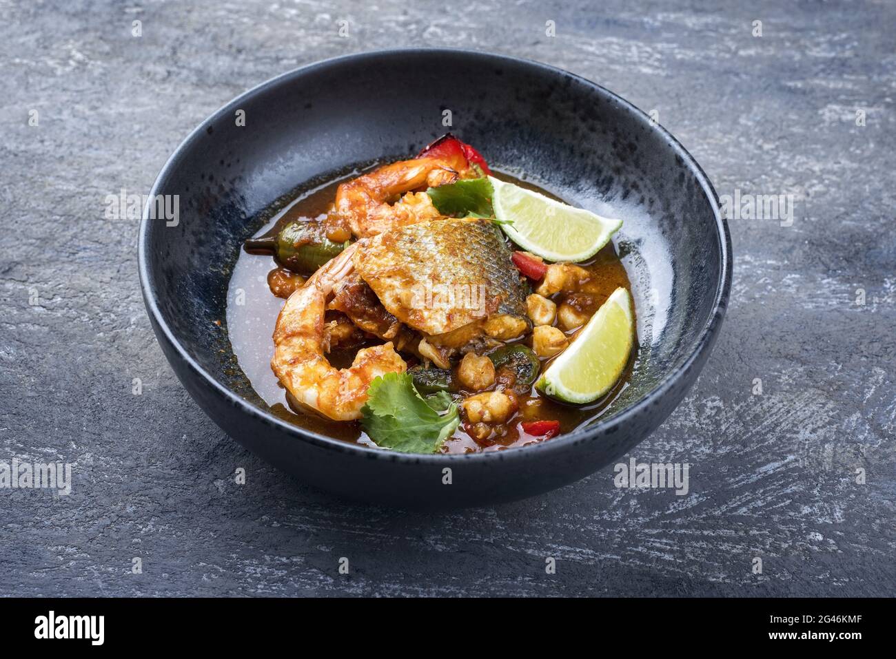 Modern style traditional Mexican seafood pozole soup with fish Stock ...