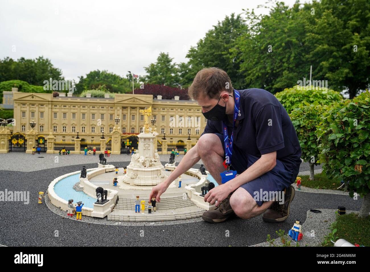 Model Maker William Saunders places Lego figures of the Brett family ...