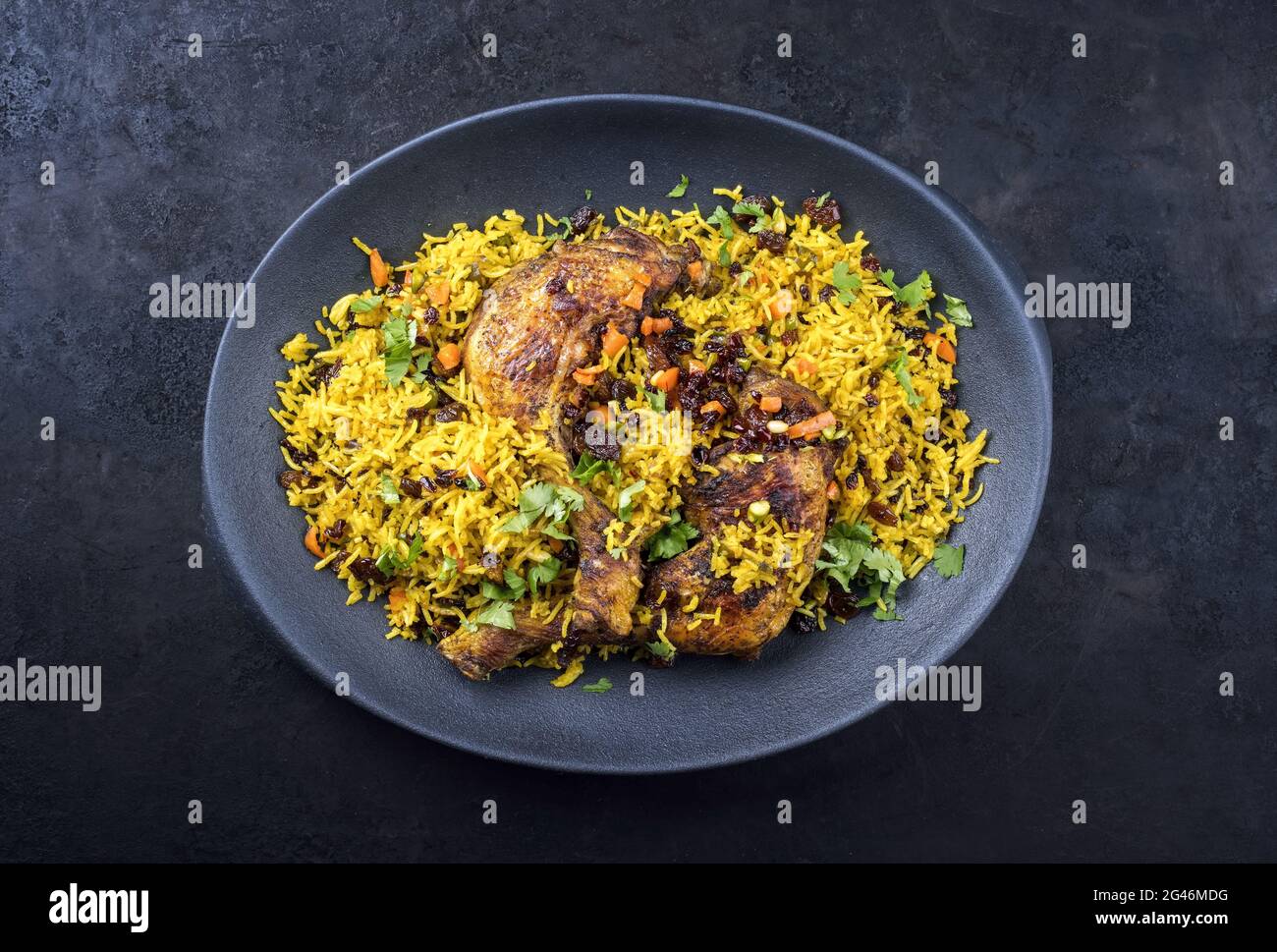 Modern style traditional fried Arabic chicken majboos with chicken leg ...