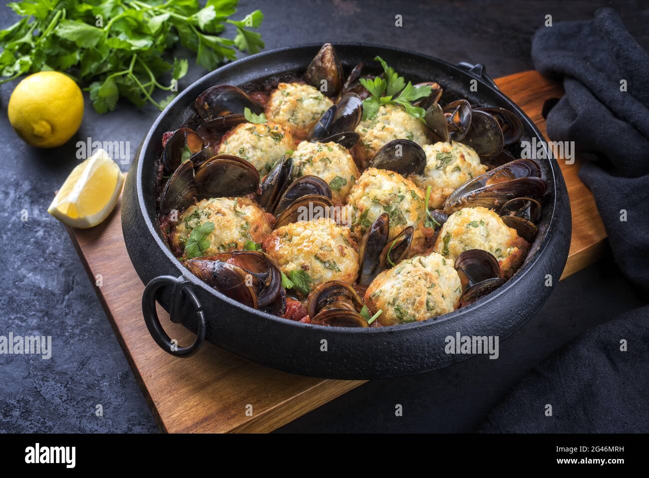 Traditional Norwegian fish ball fiskeboller with fish and mussels in ...