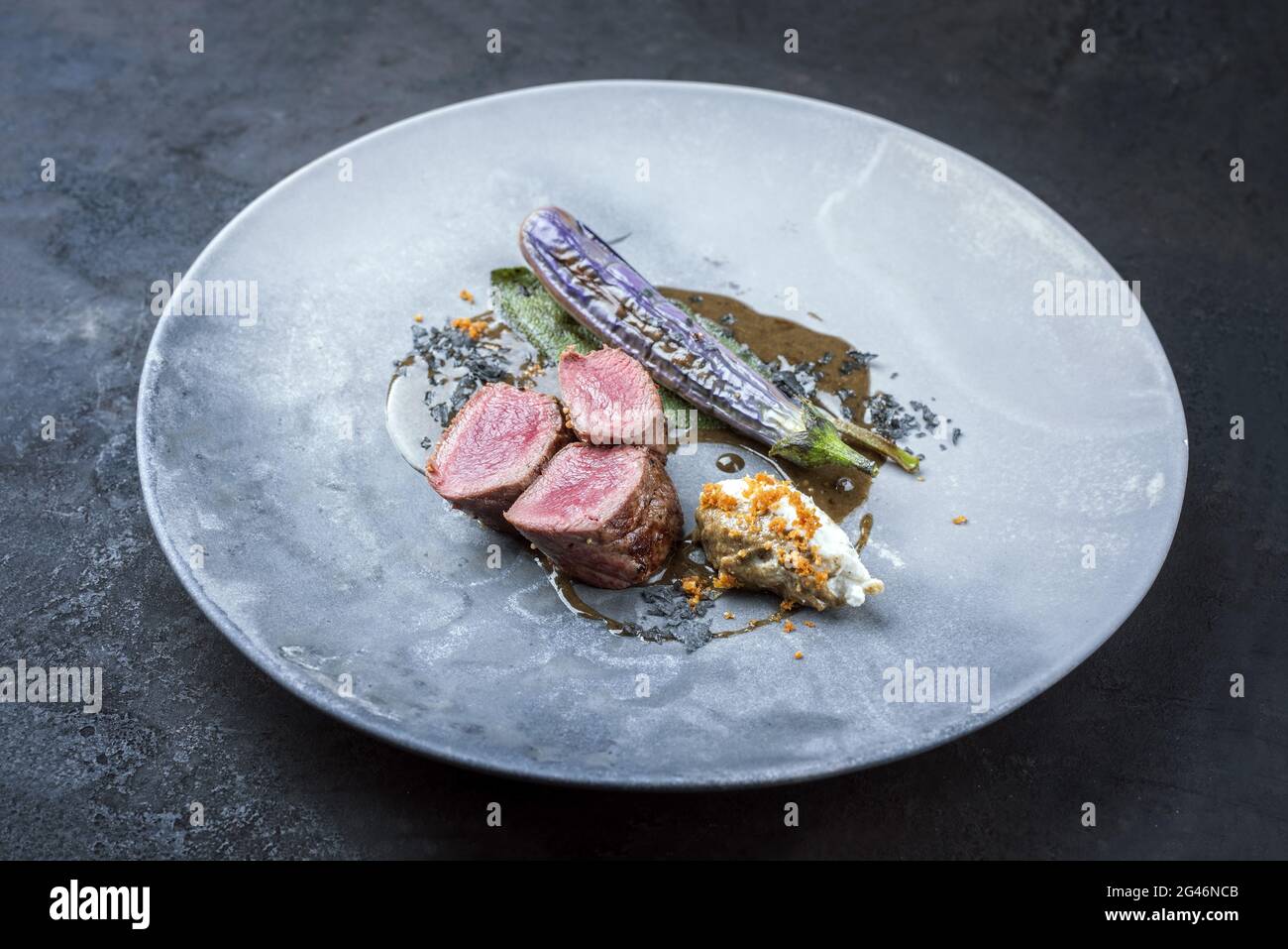 Modern style traditional wild hare back filet braised with baby ...