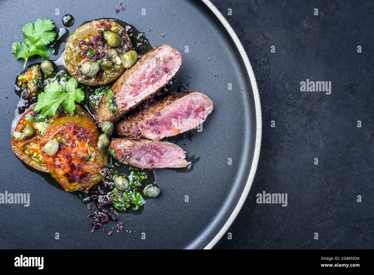 Modern style traditional wild hare back filet braised with tomato ...