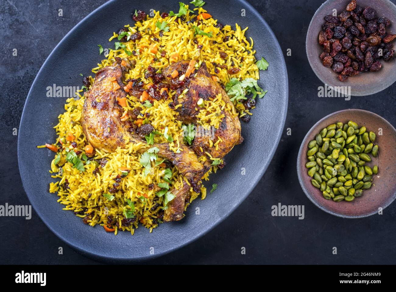 Modern style traditional fried Arabic chicken majboos with chicken leg ...