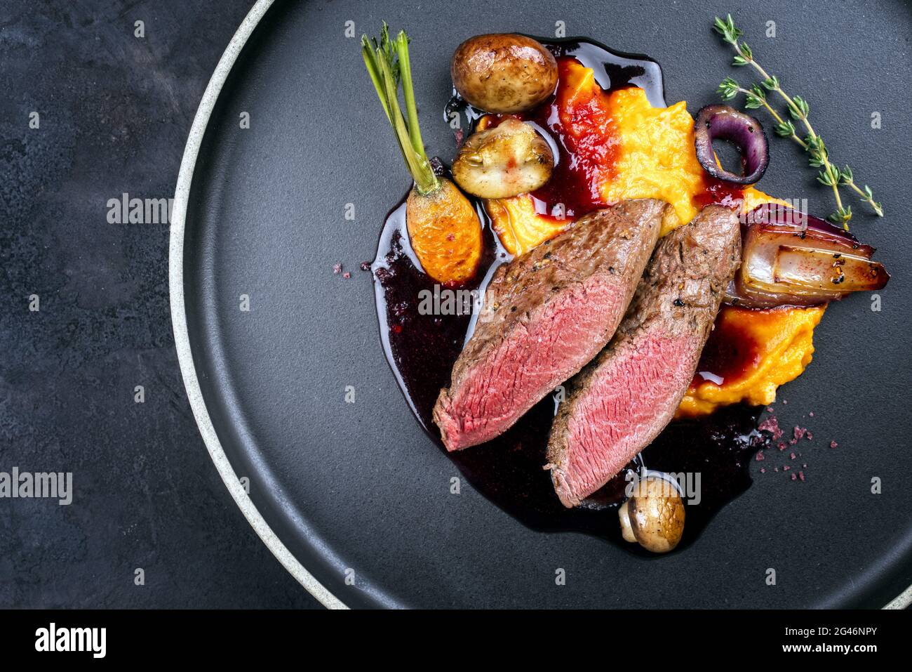 Modern style traditional wild hare back filet braised with wild berries ...