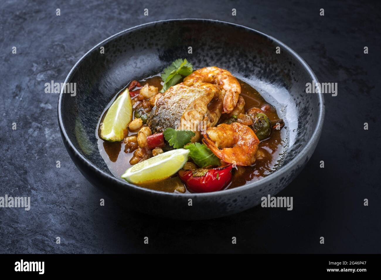 Modern style traditional Mexican seafood pozole soup with fish Stock ...