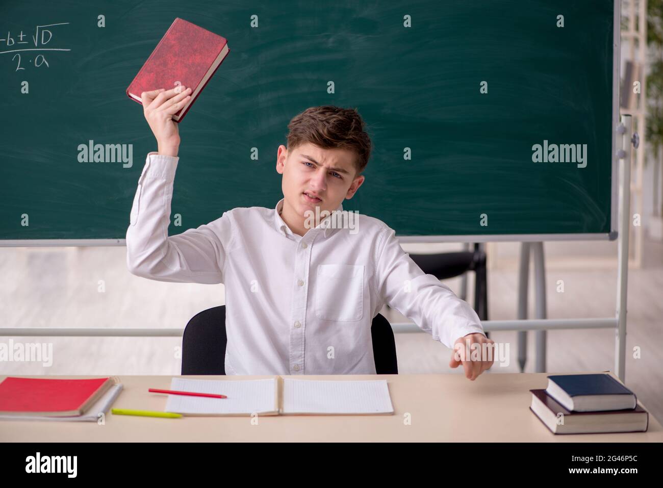 Angry school kid in class hi-res stock photography and images - Alamy