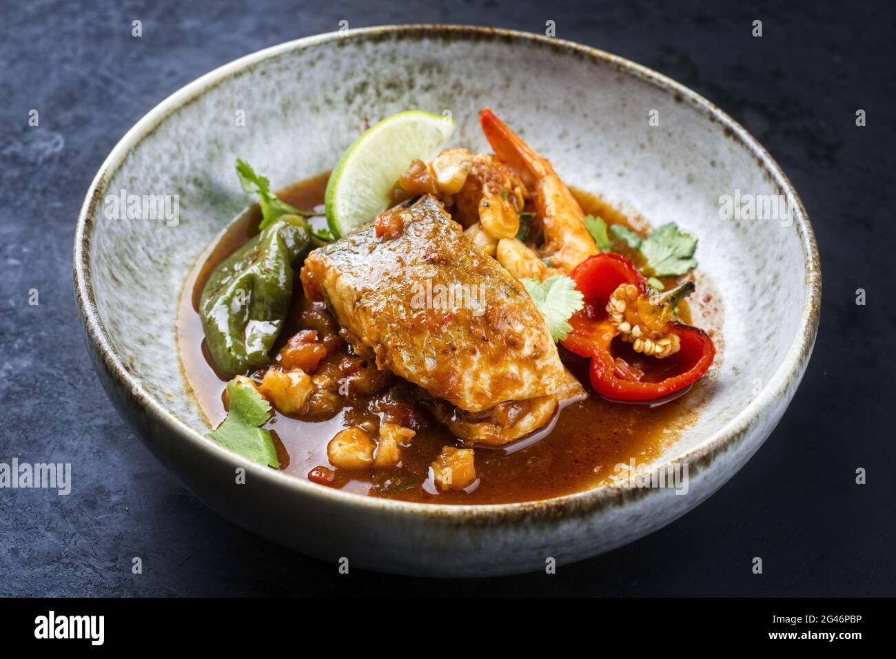 Modern style traditional Mexican seafood pozole soup with fish Stock ...