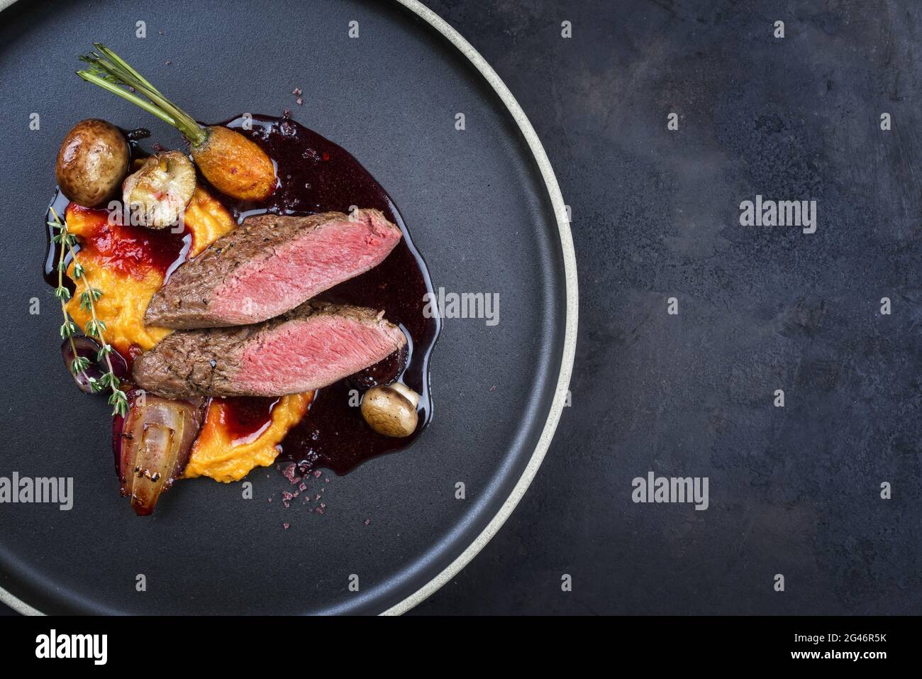 Modern style traditional wild hare back filet braised with wild berries ...