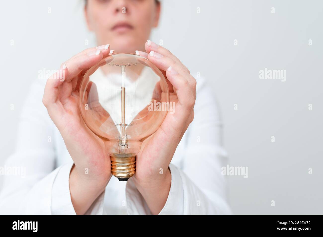 Lady Holding Lamp With Formal Outfit Presenting New Ideas For Project ...