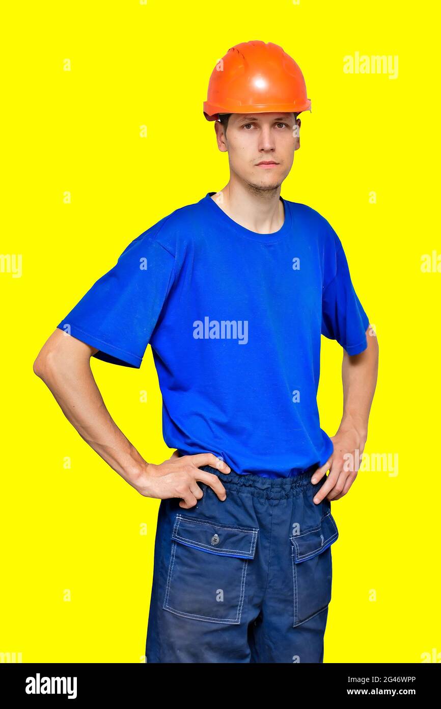 Men in blue work uniform hi-res stock photography and images - Alamy