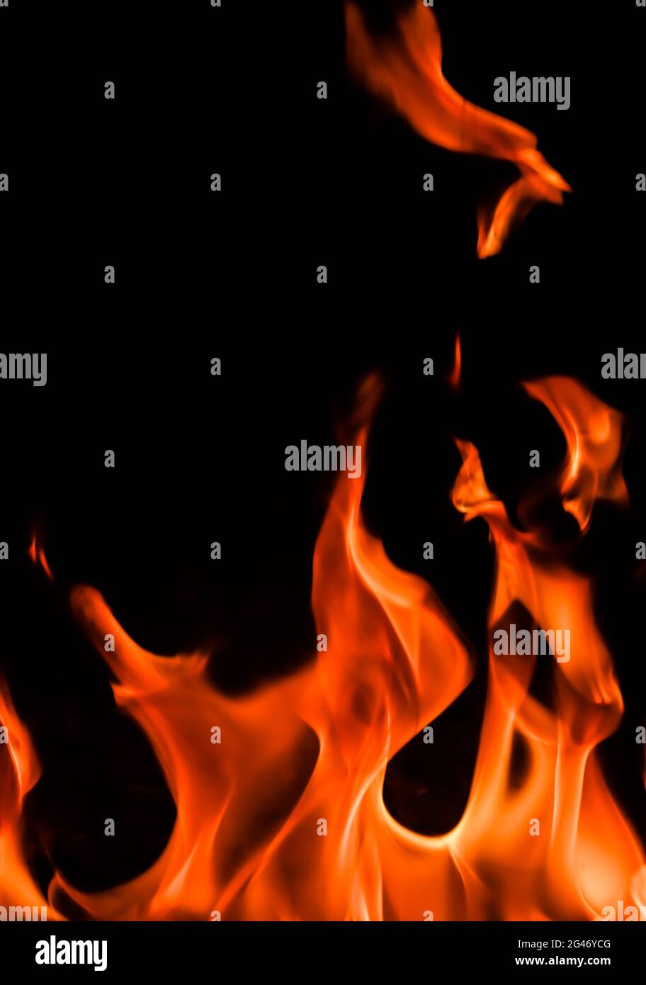 Red blaze Fire flame on a black background Stock Photo - Alamy