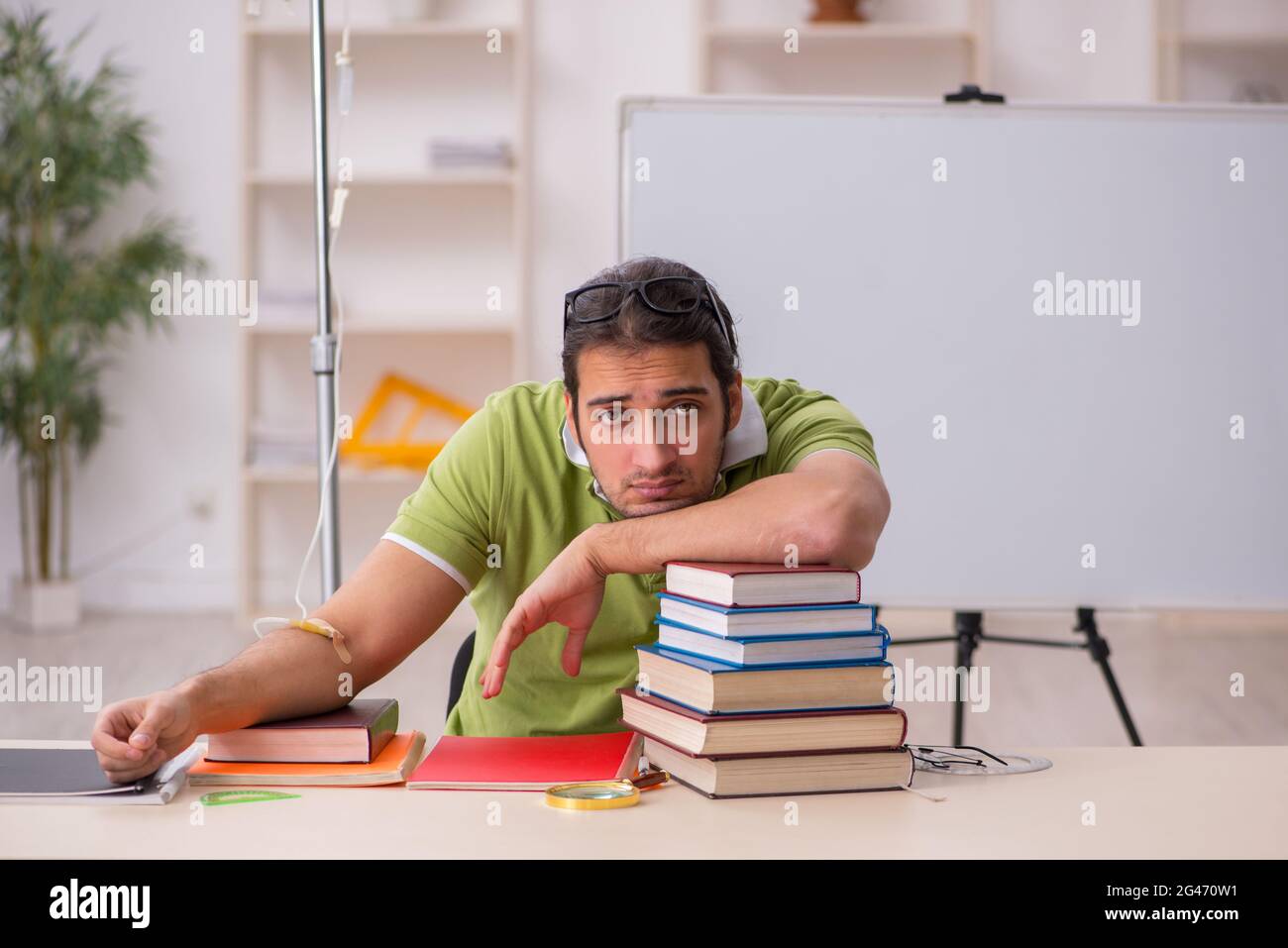 Young sick teacher student in blood transfusion concept Stock Photo - Alamy