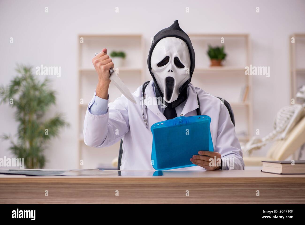 Devil doctor working at the hospital Stock Photo - Alamy