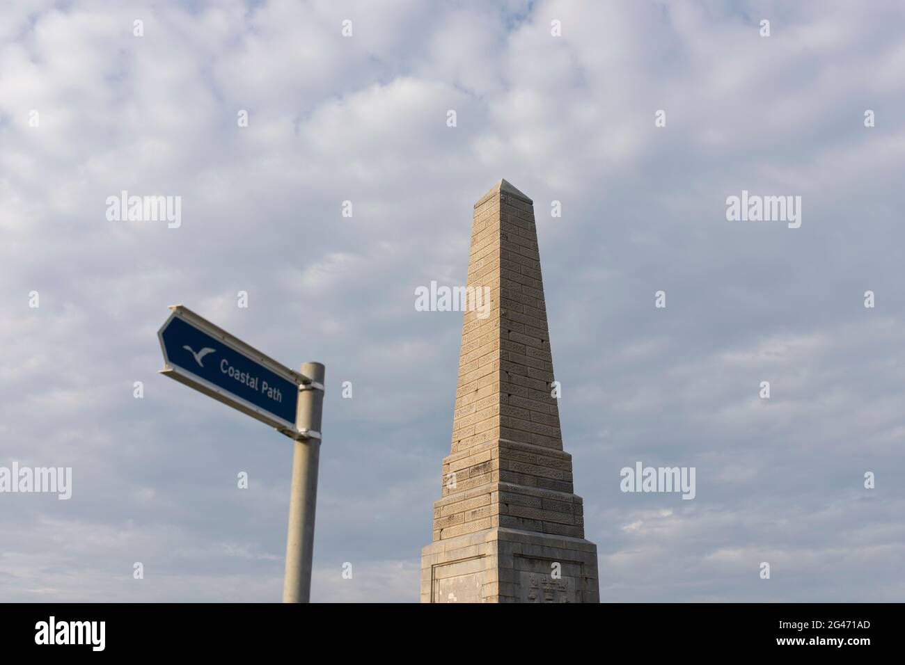 A 'coastal path' sign besides The Earl of Yarborough Monument, as seen ...