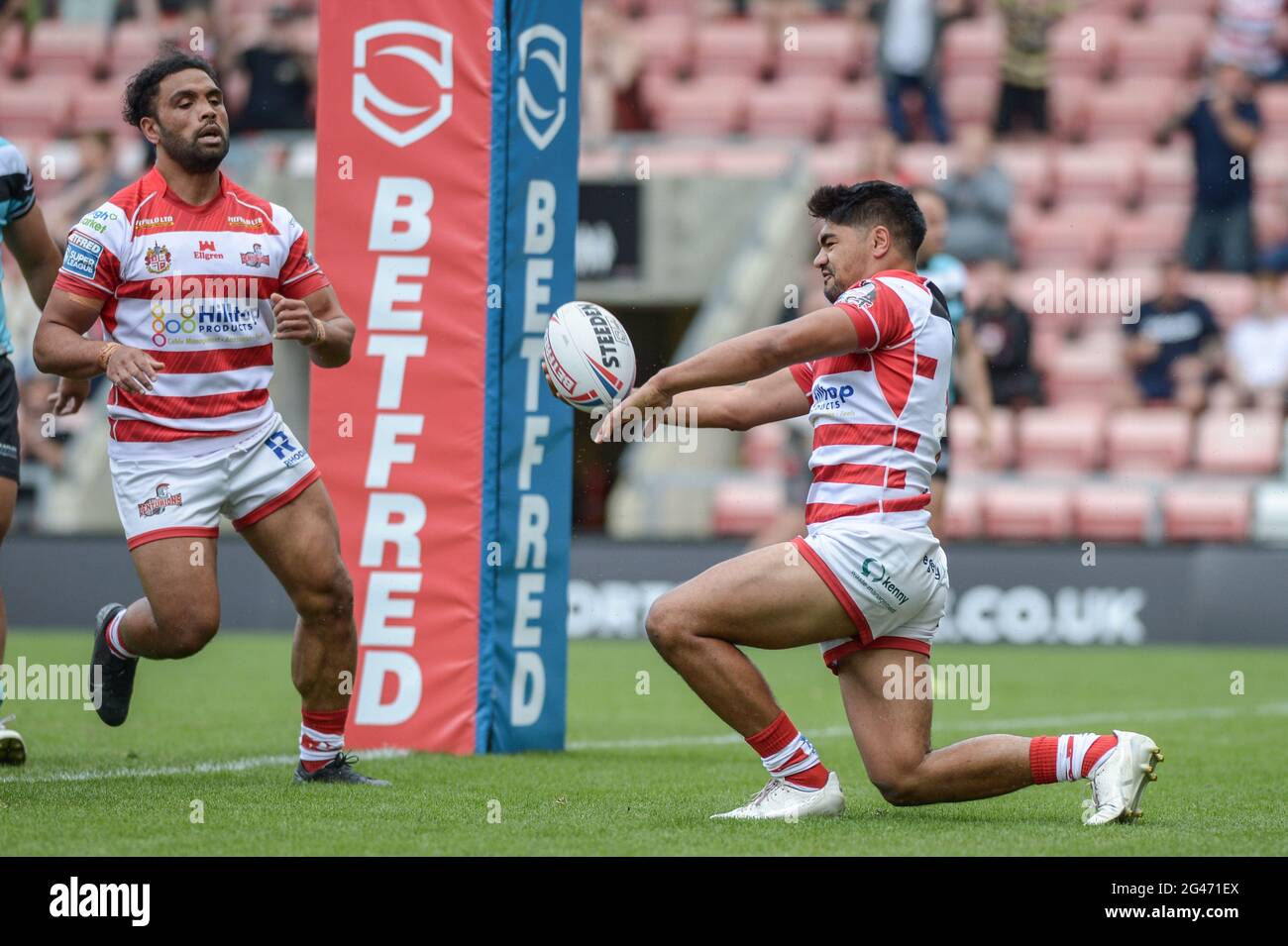 Leigh, UK. 19 June 2021. James Bell of Leigh Centurions celebrates try ...