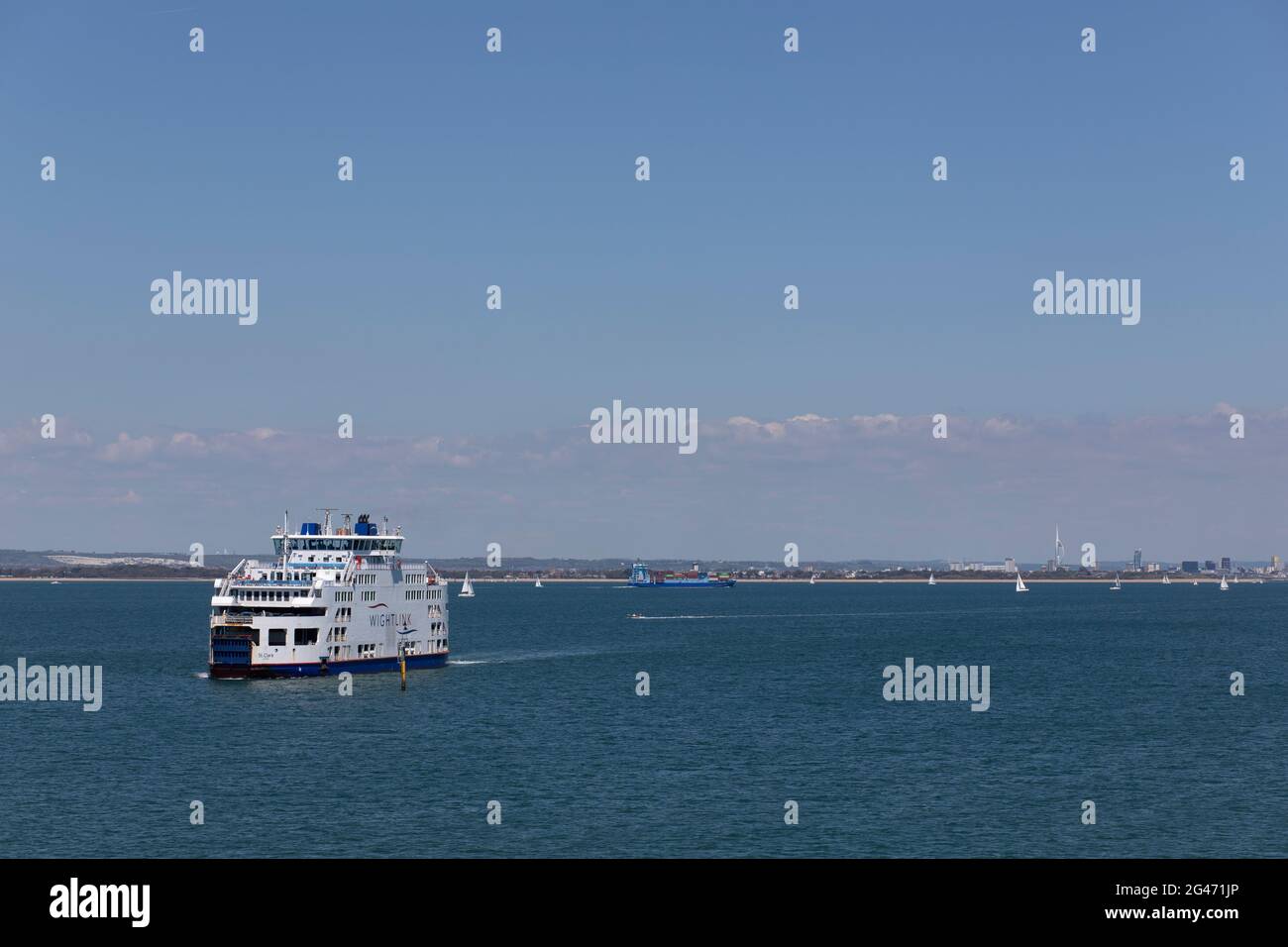 A Wight Link passenger / car ferry, en route in The Solent, between ...